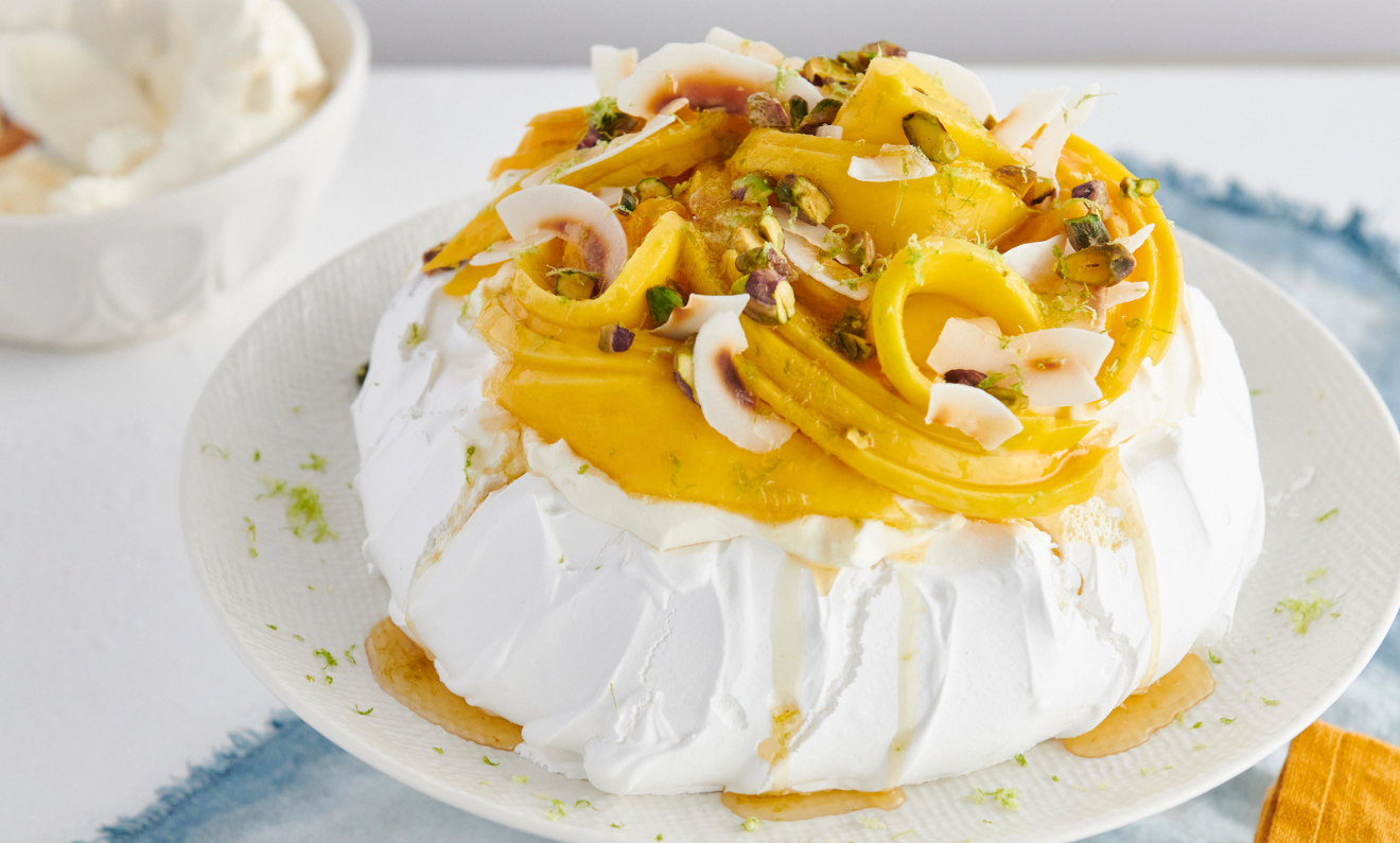 Mango Pavlova with Coconut, Pistachio and Lime Honey Drizzle | Capilano ...